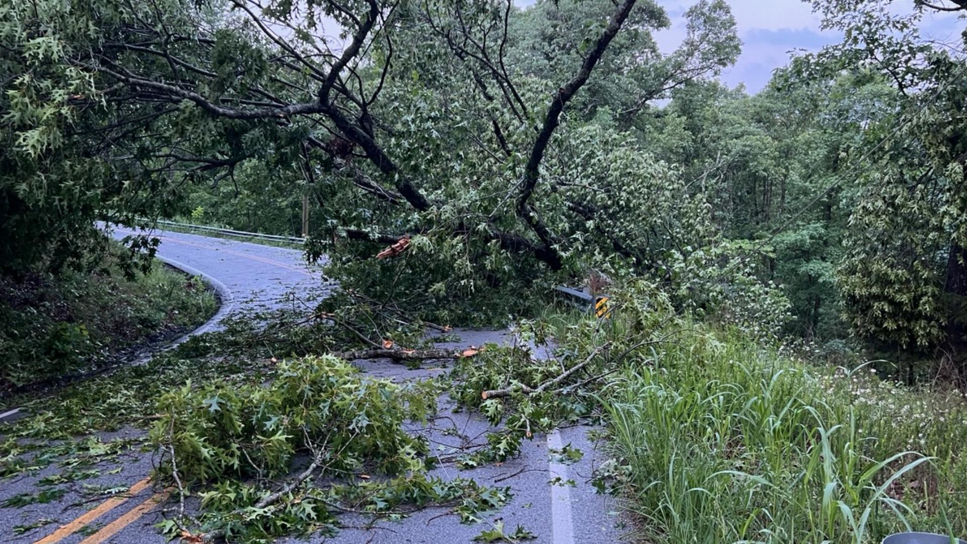 Photos: Storm damage after tornadoes move through Northwest Arkansas ...