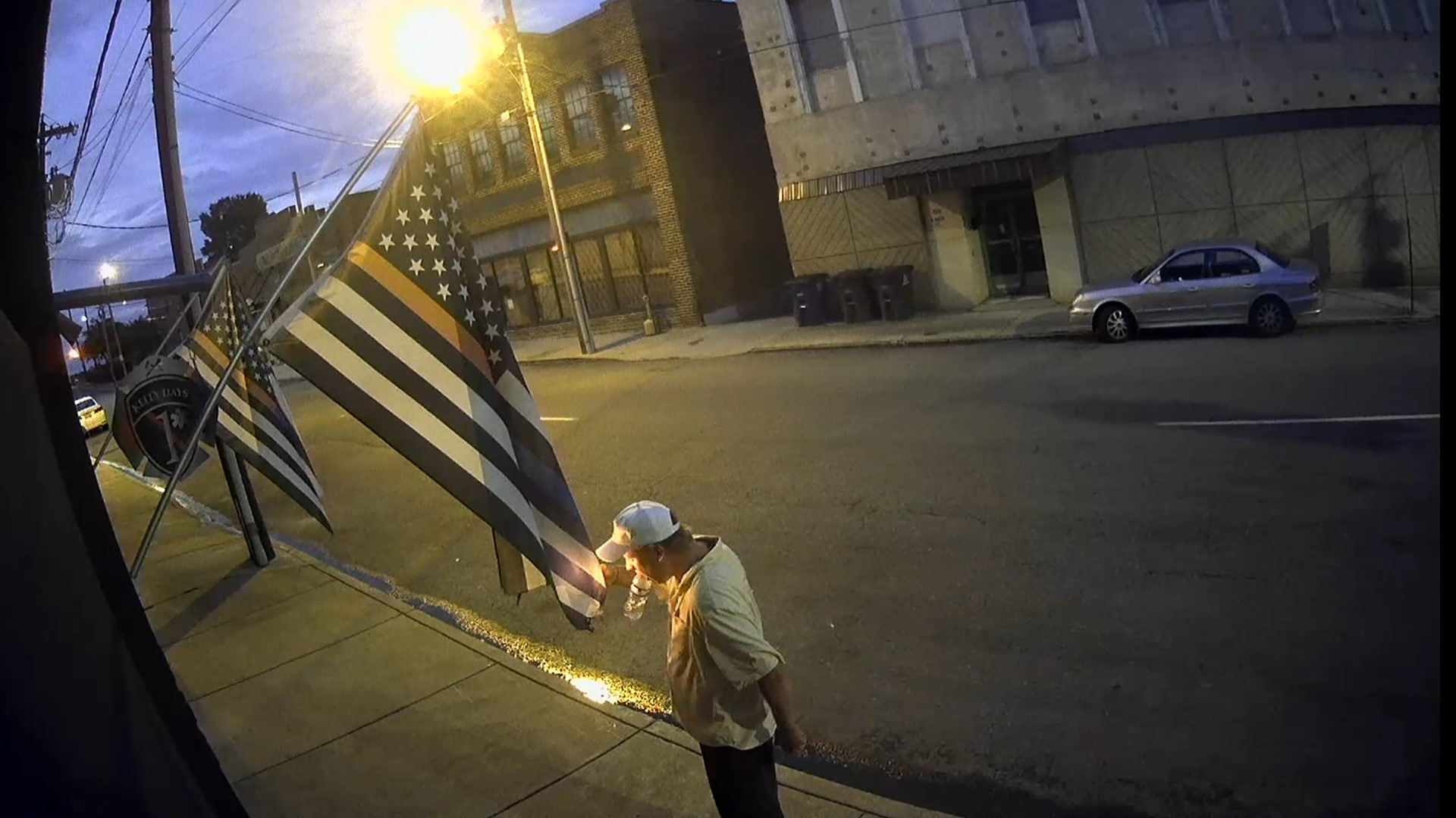 Man seen on video trying to burn 'Blue Line' flags outside bar popular ...