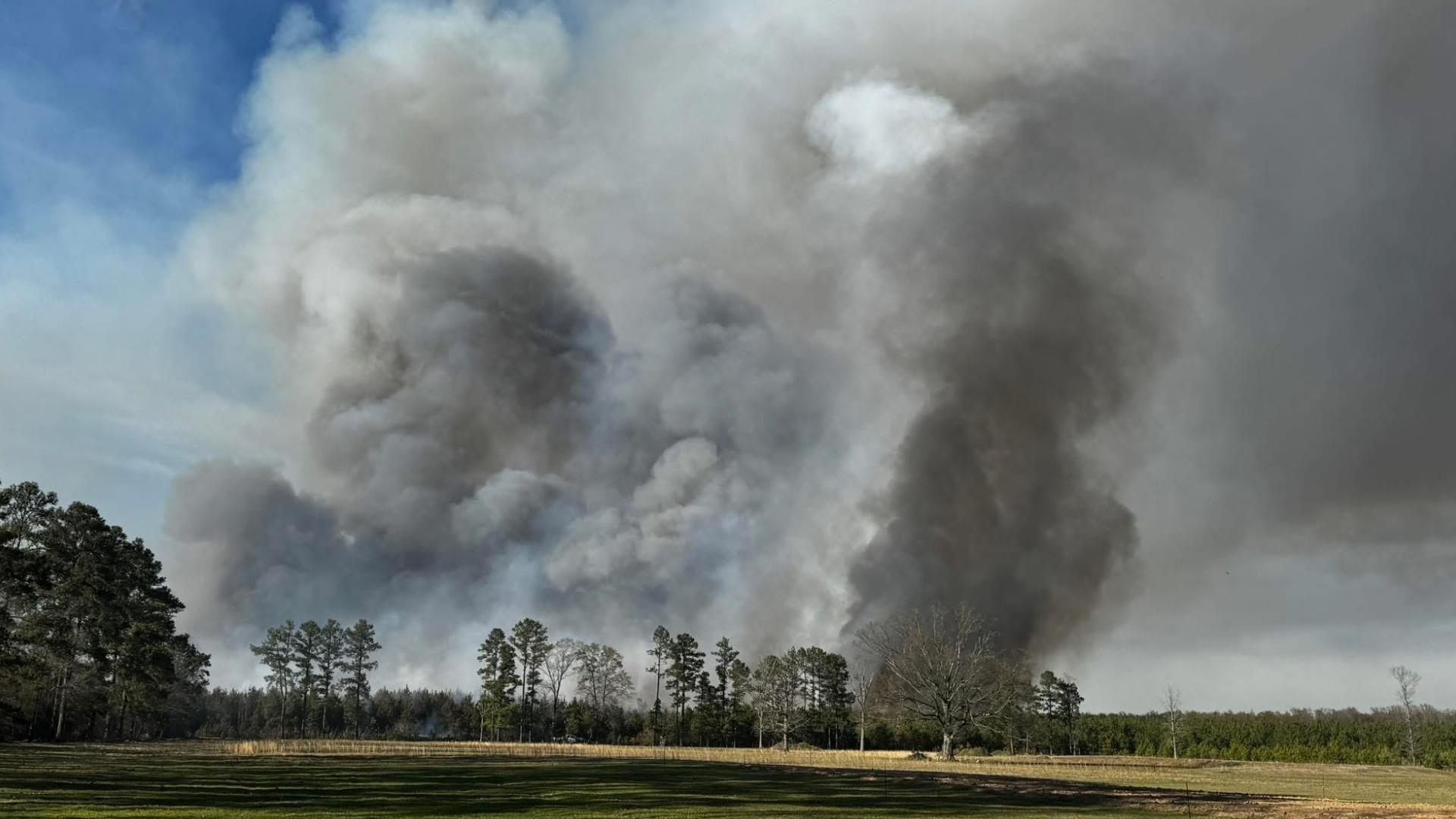 Fire officials working to extinguish fire near Camden | thv11.com