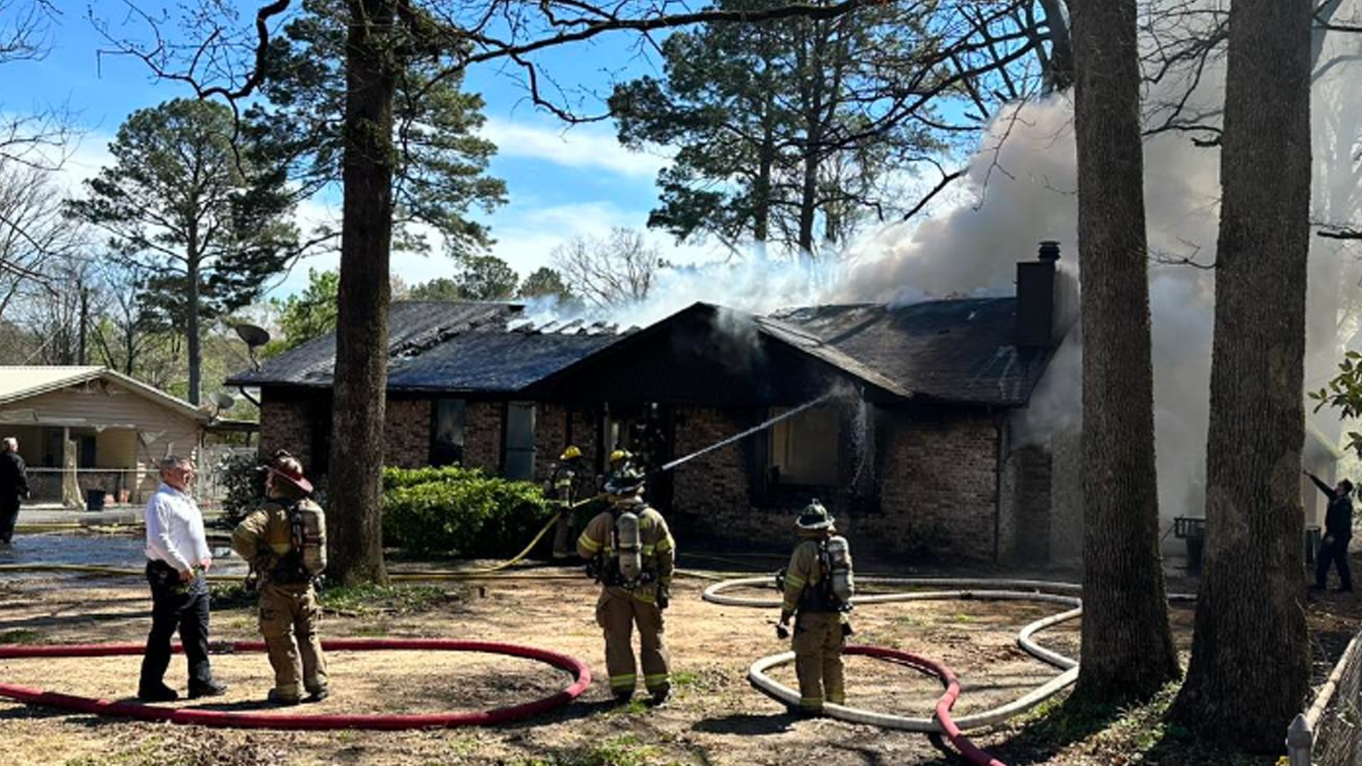 Firefighters work to put out Bryant house fire | thv11.com