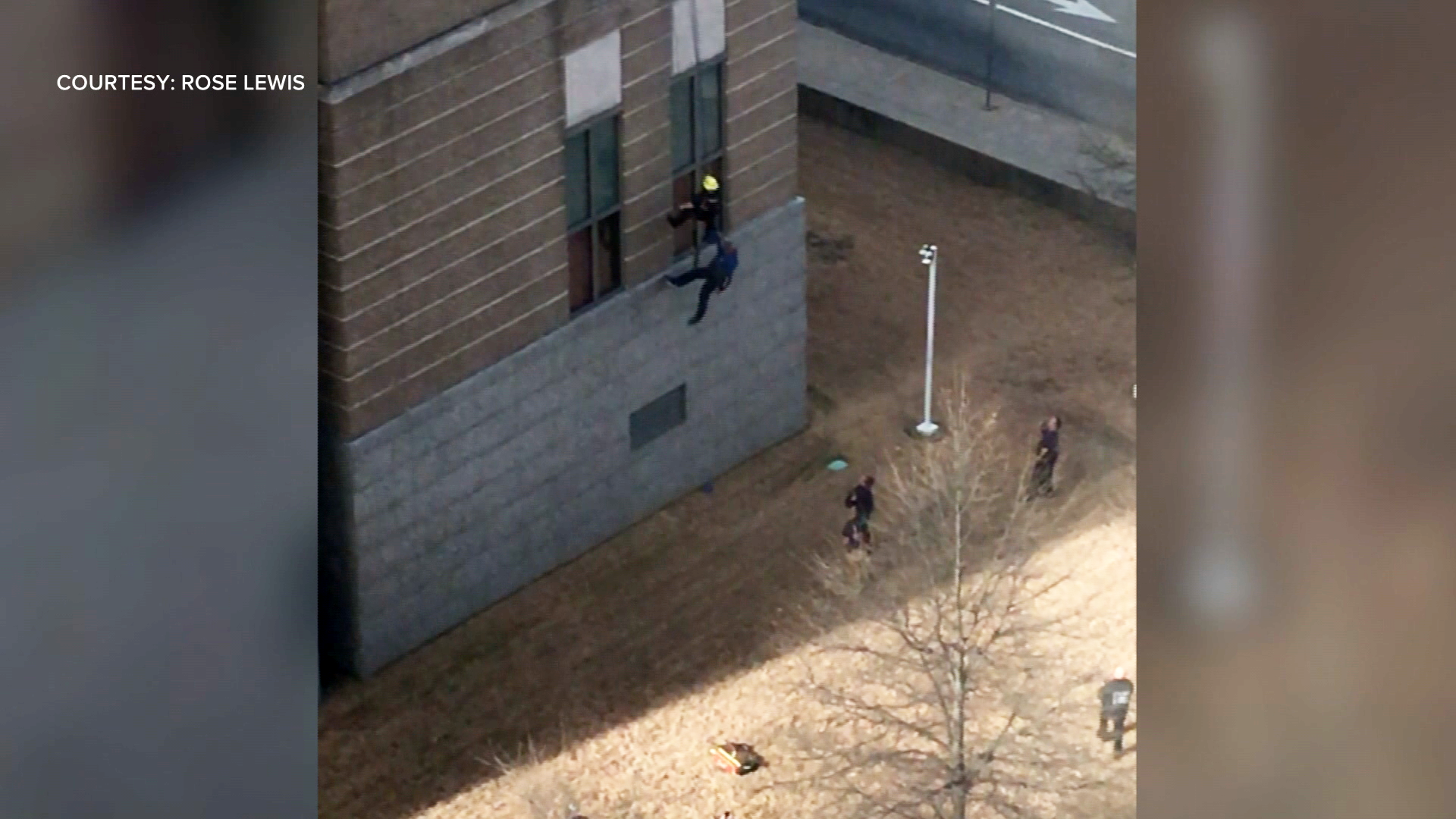 Firefighters rescue window washer hanging 30 feet from downtown Little ...