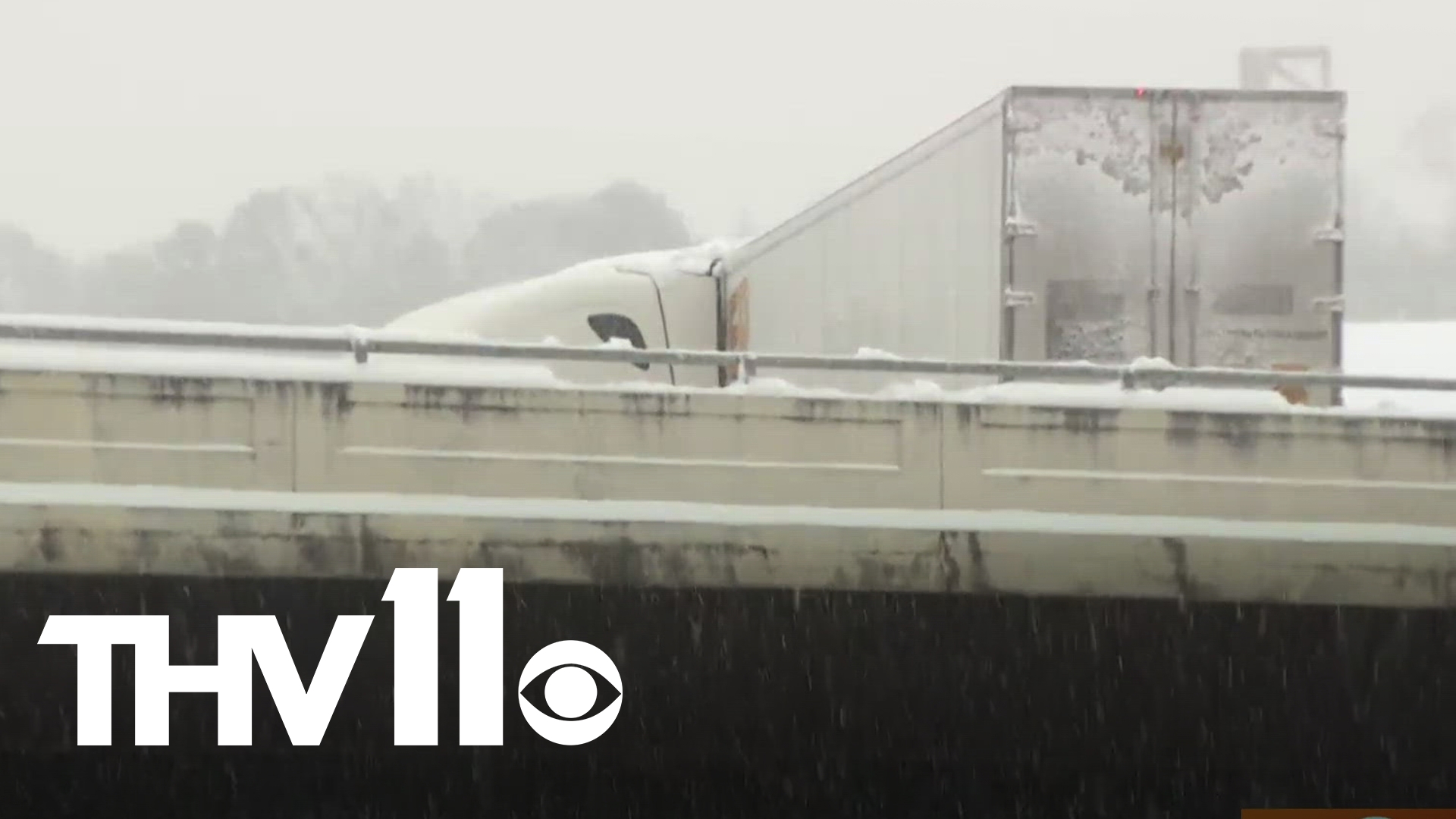 18-wheeler stuck on bridge in North Little Rock during snowfall | thv11.com