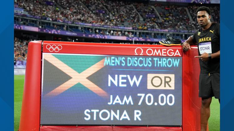 Razorback Rojé Stona takes Olympic gold with record discus throw ...