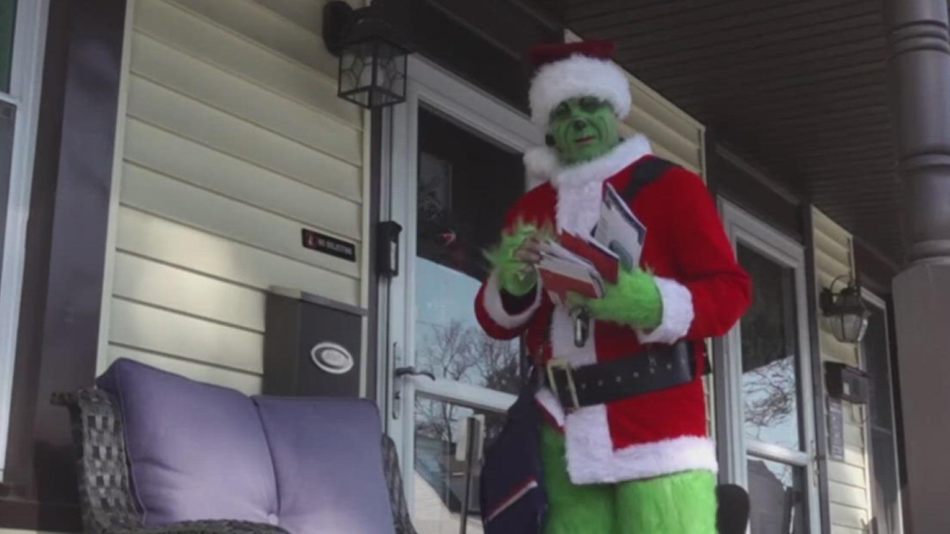 Mail carrier delights community with Grinch costume, spreads festive ...